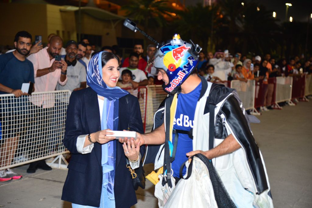 Batelco Delivers iPhone 15 to First Customer by Red Bull Wingsuit ...